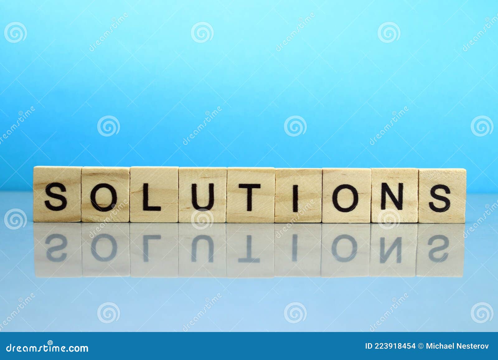 Solution Word Made of Wooden Blocks on a Blue Background Stock Photo ...