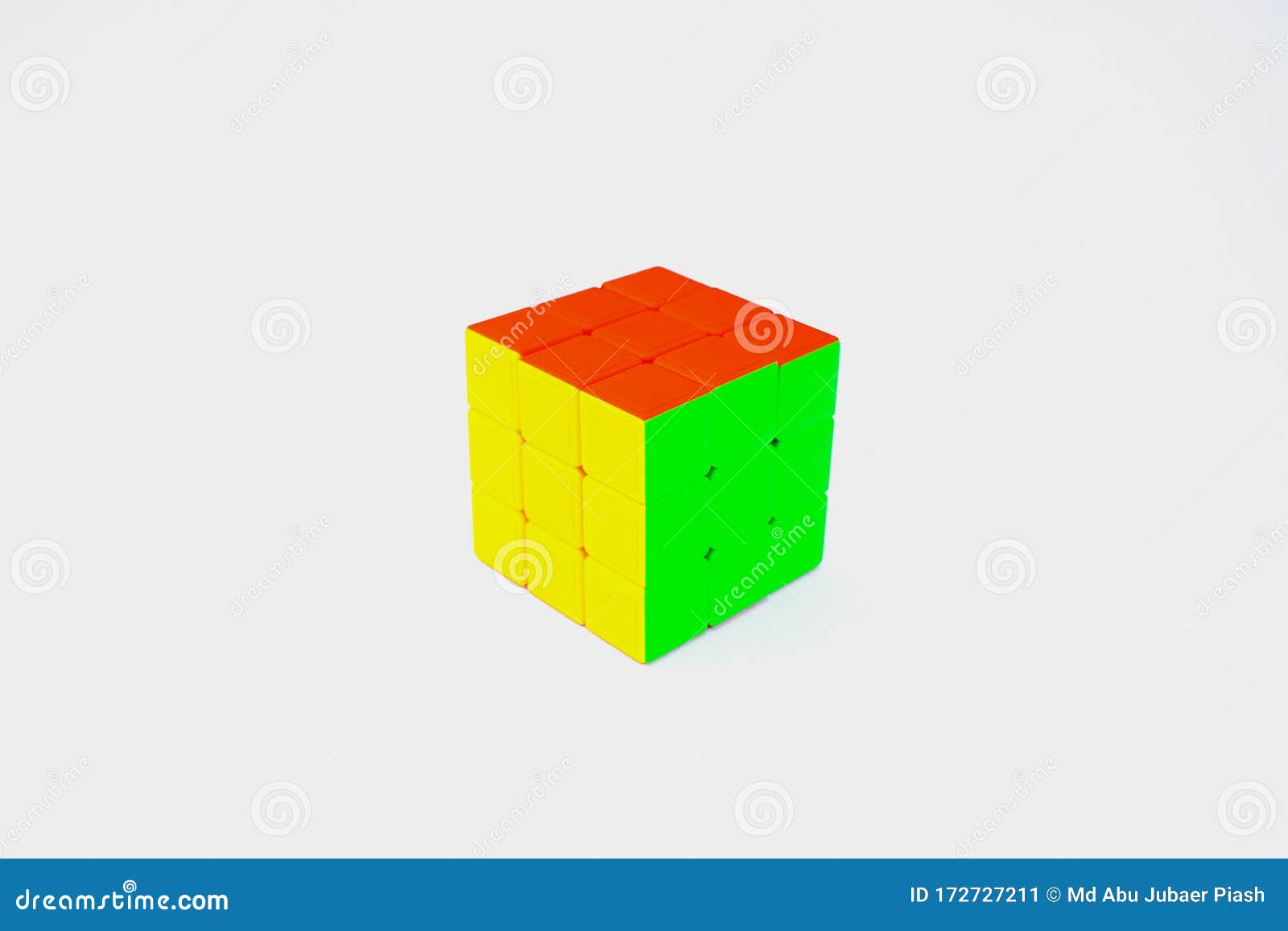 A Solved Rubik Cube Isolated in a White Background,displaying Red Green ... A Solved Rubik Cube Isolated in a White Background,displaying Red Green ...