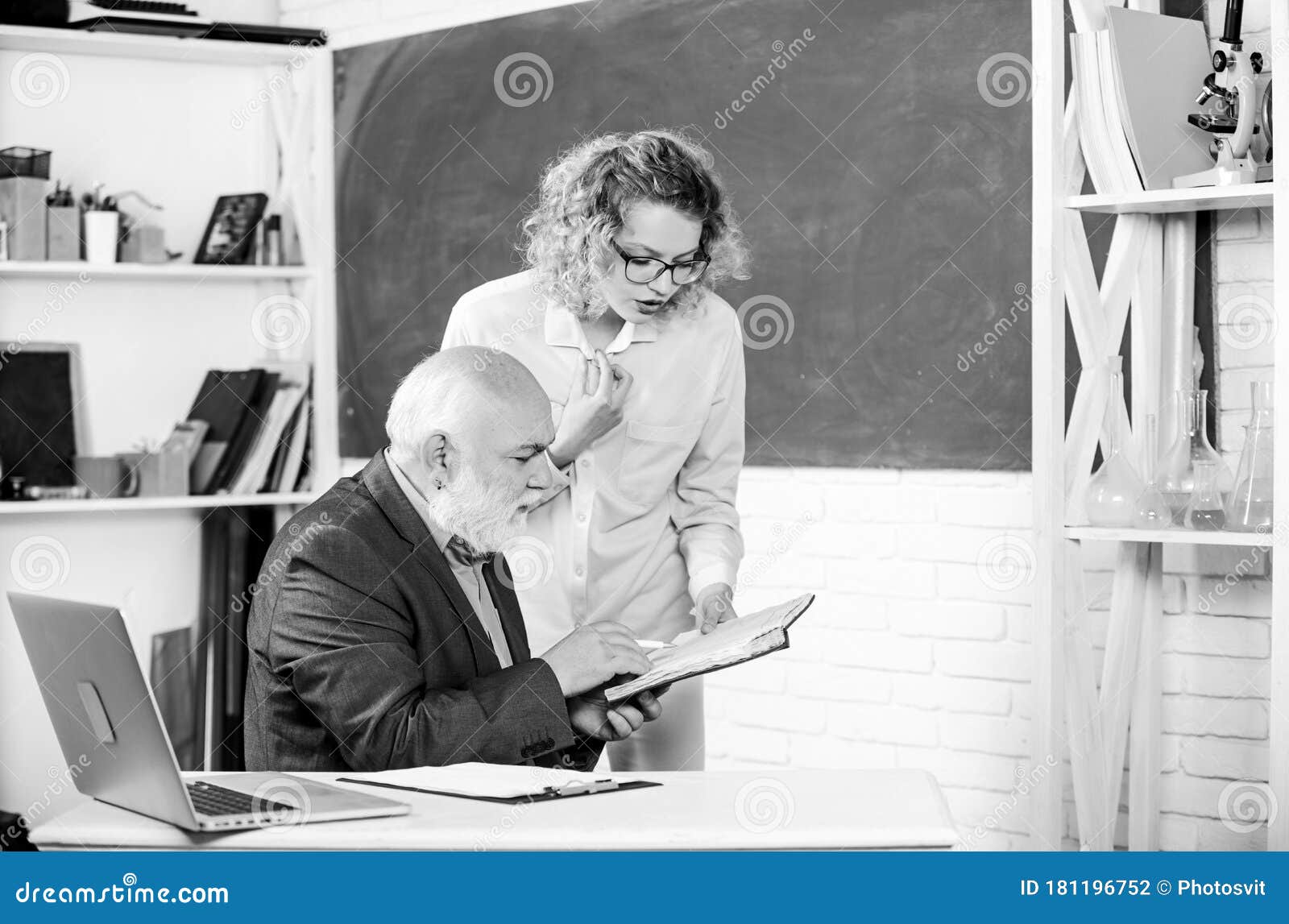 Solving Math Tasks. School Education Concept. Check Homework. Educator ...