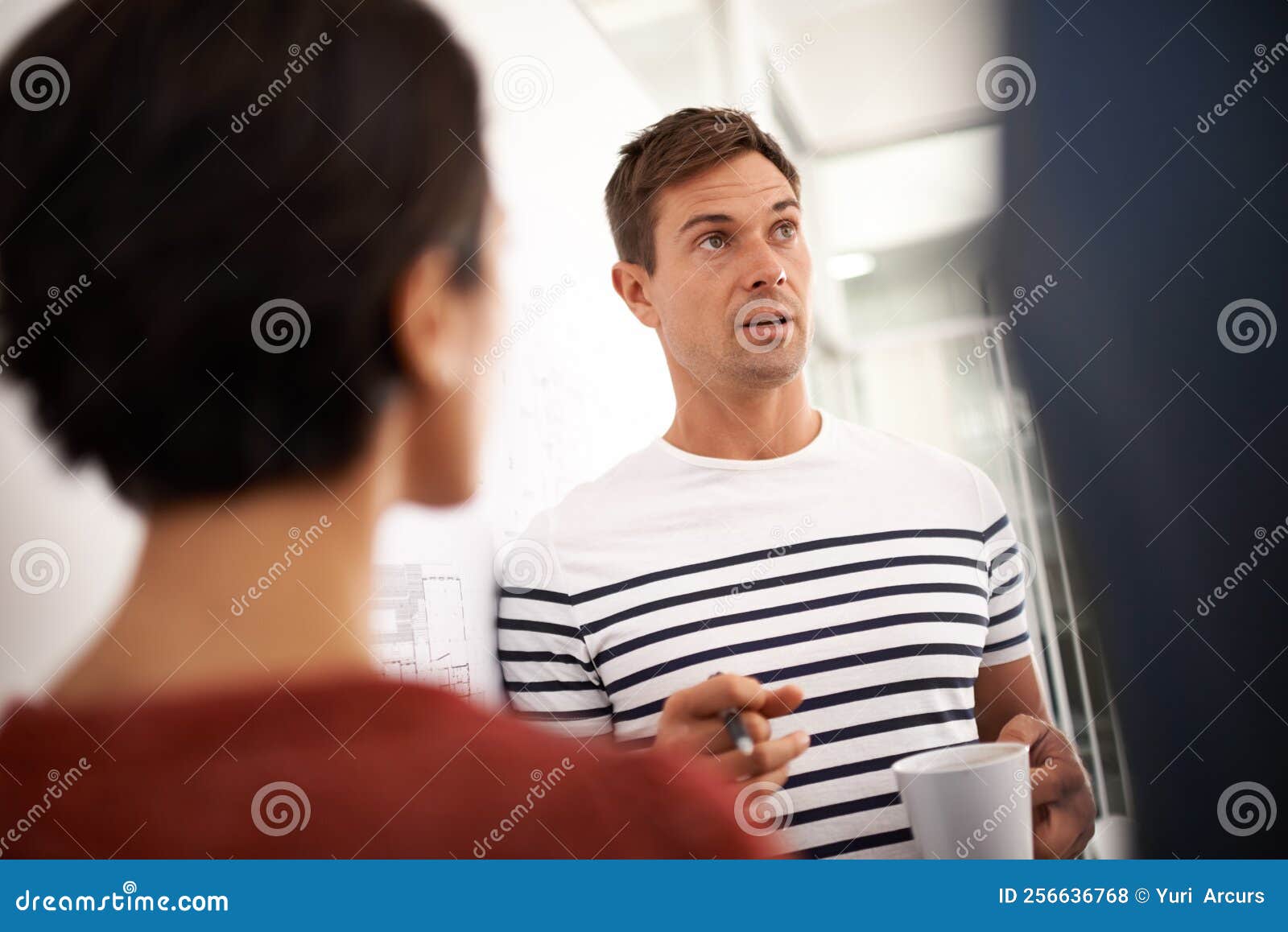 Solving Problems As a Team. a a Young Man Giving a Presentation To His ...