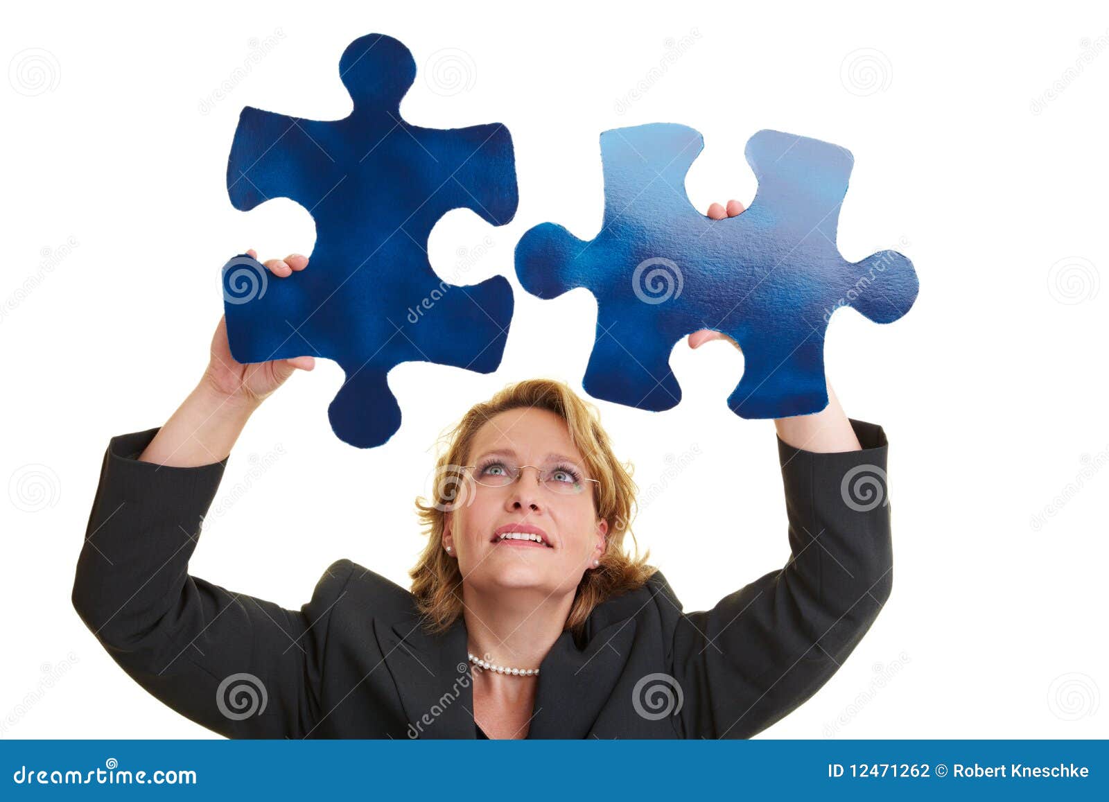 Solving a puzzle stock photo. Image of manager, female - 12471262