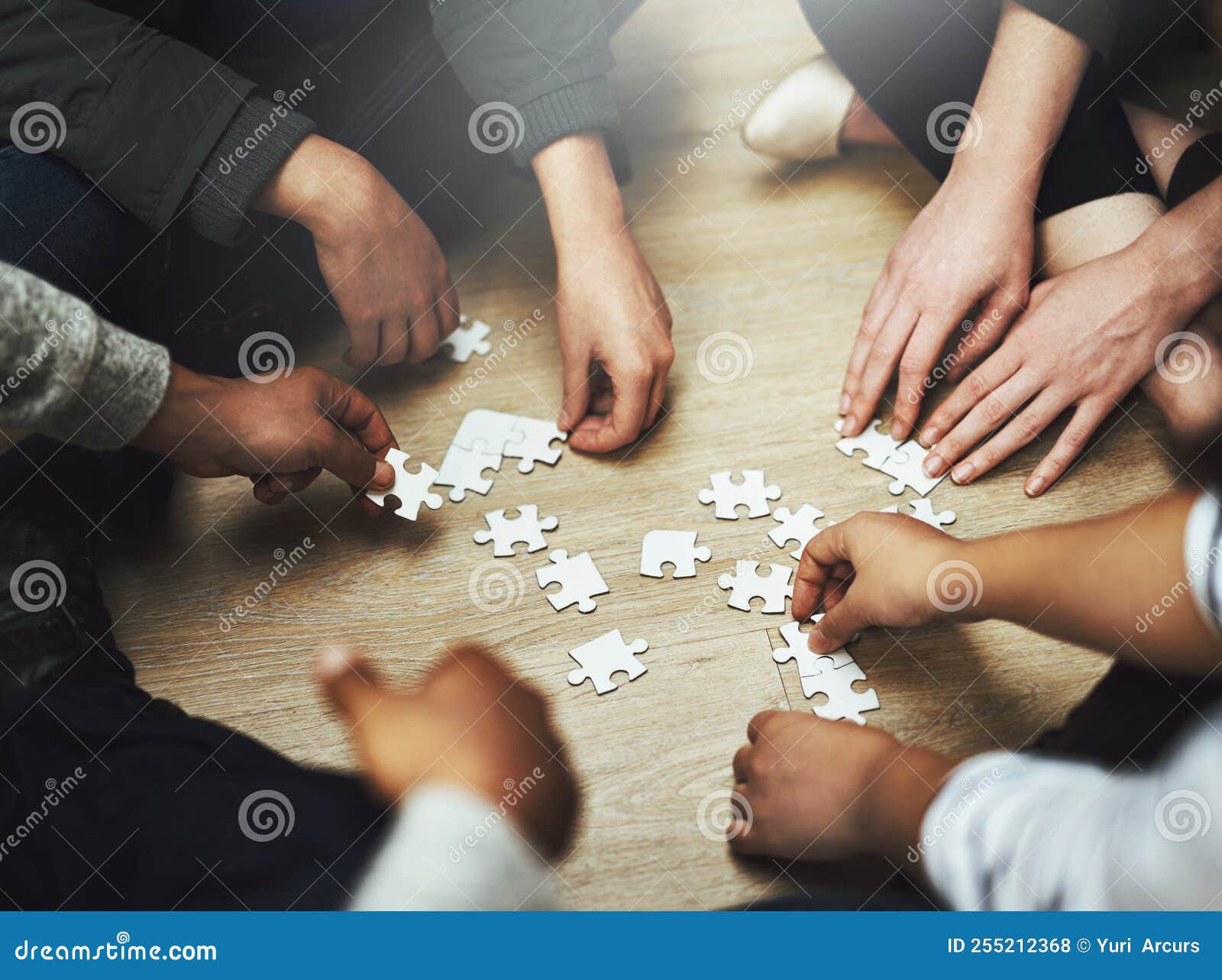 Solving the Puzzle One by One. a Group of Unrecognizable People Fitting ...