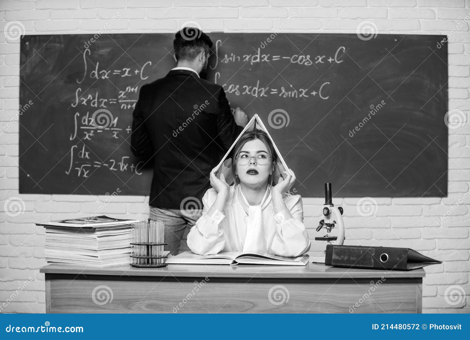 Solving Task. Man Writing on Chalkboard Math Formulas. Teaching in ...