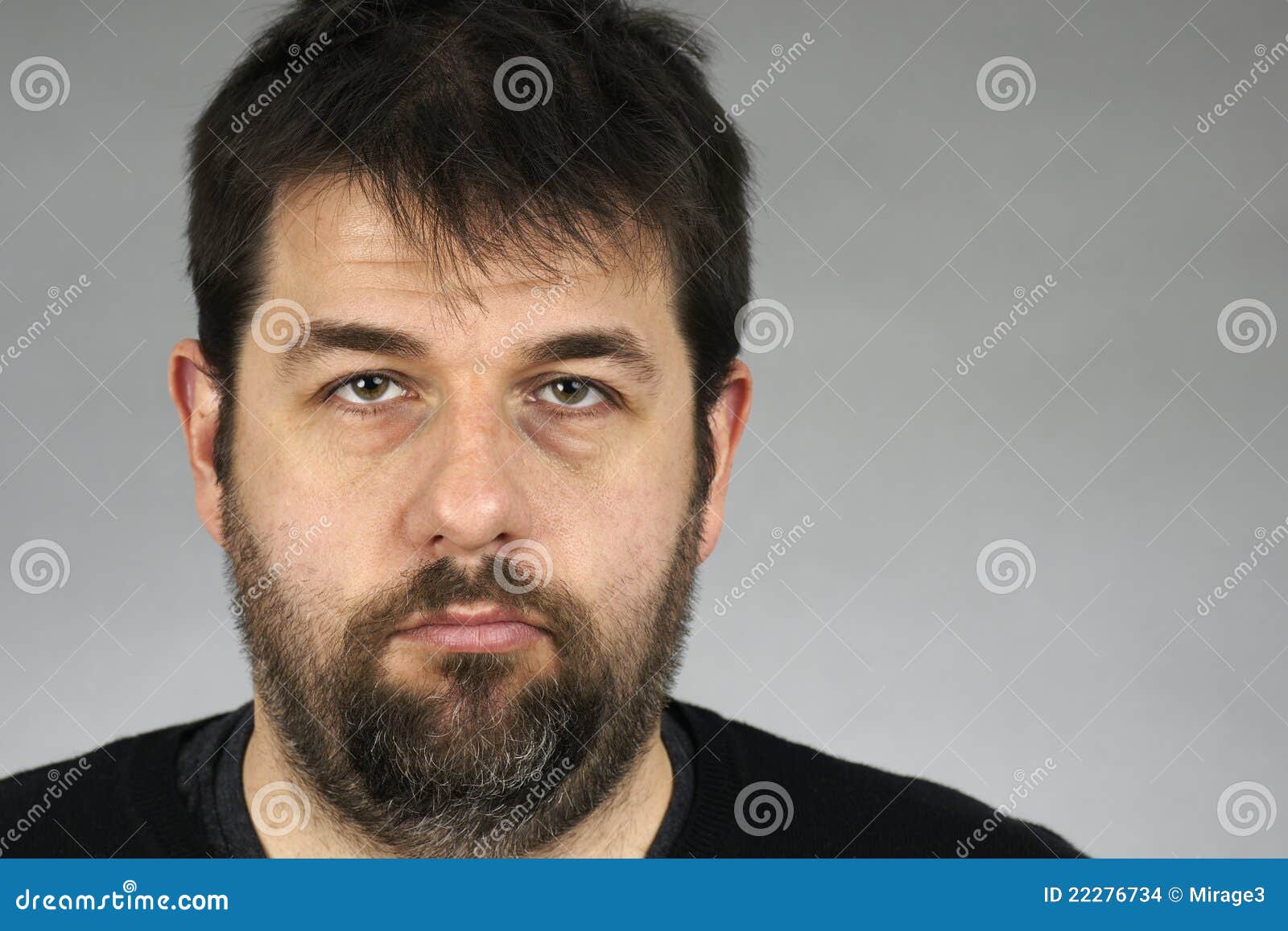 Somber Bearded Man Over Grey Stock Photo - Image of male, unhappy: 22276734