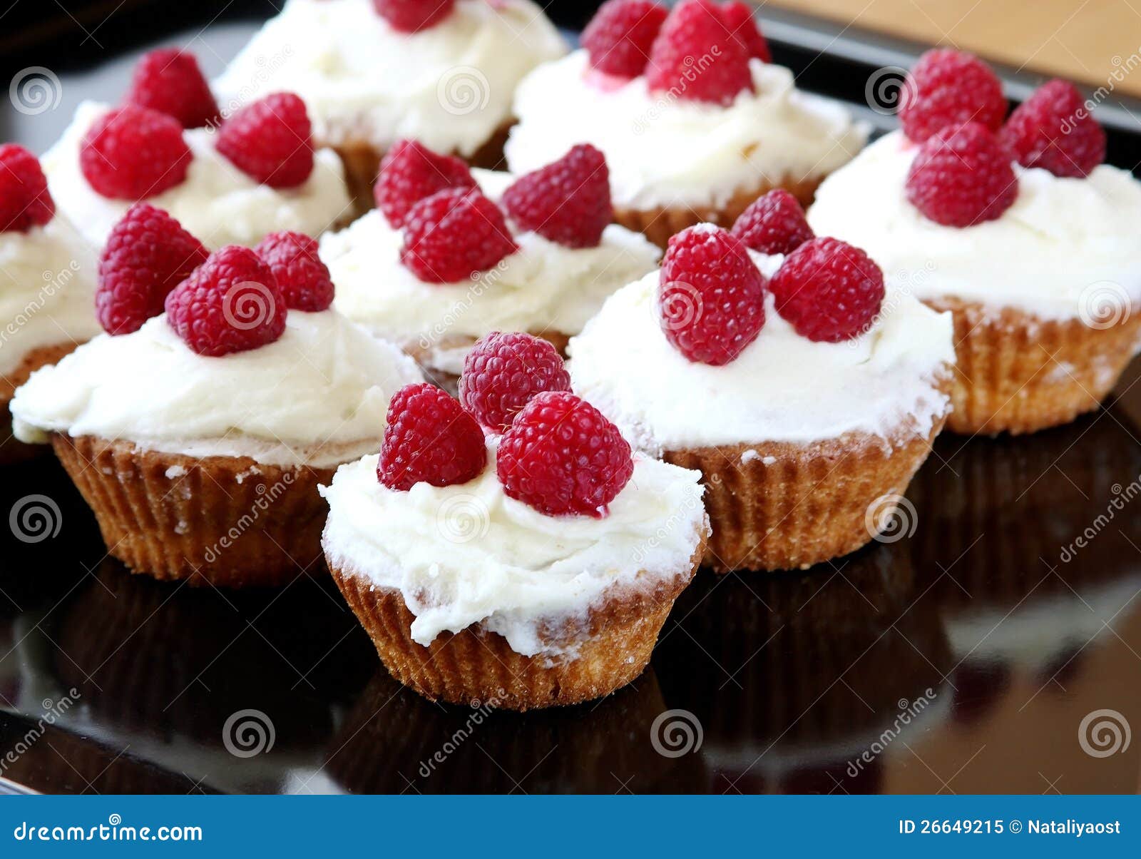 Some Appetizing Fruitcakes on Black Baking Sheet Stock Image - Image of ...