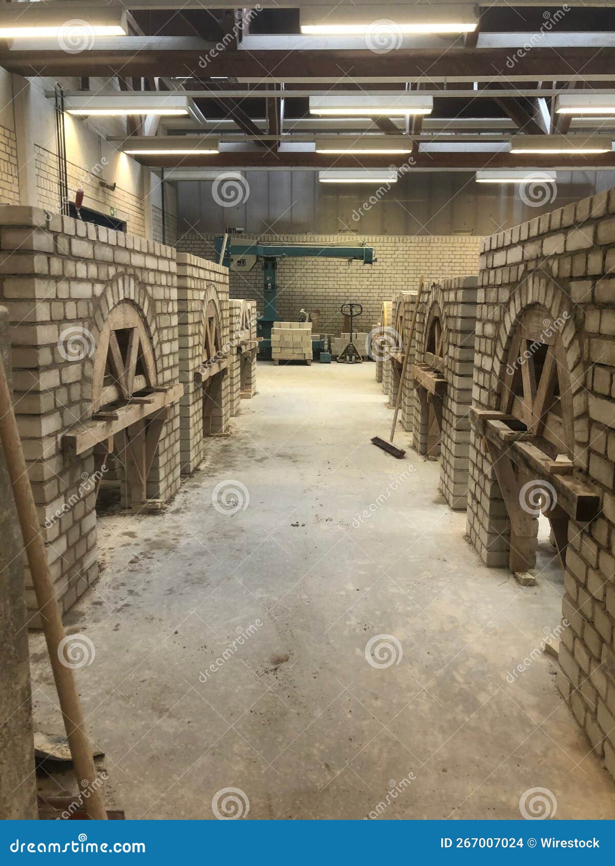 Brick Construction Inside a Building with Lights Around Stock Photo ...