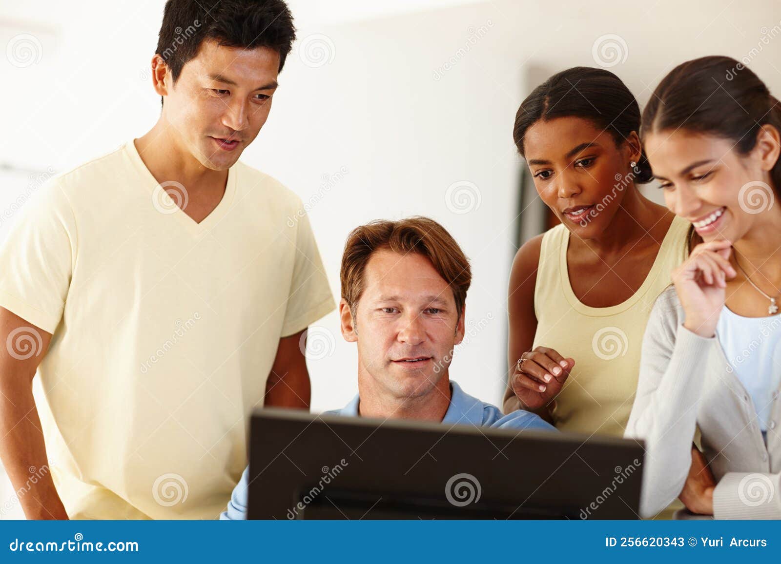 Some are Doing Better Than Others. a Work Team Gathered Around a ...