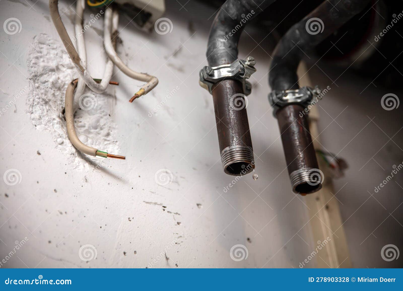 Exposed Unsecured Electrical Cables and Unconnected Water Pipes Stock ...