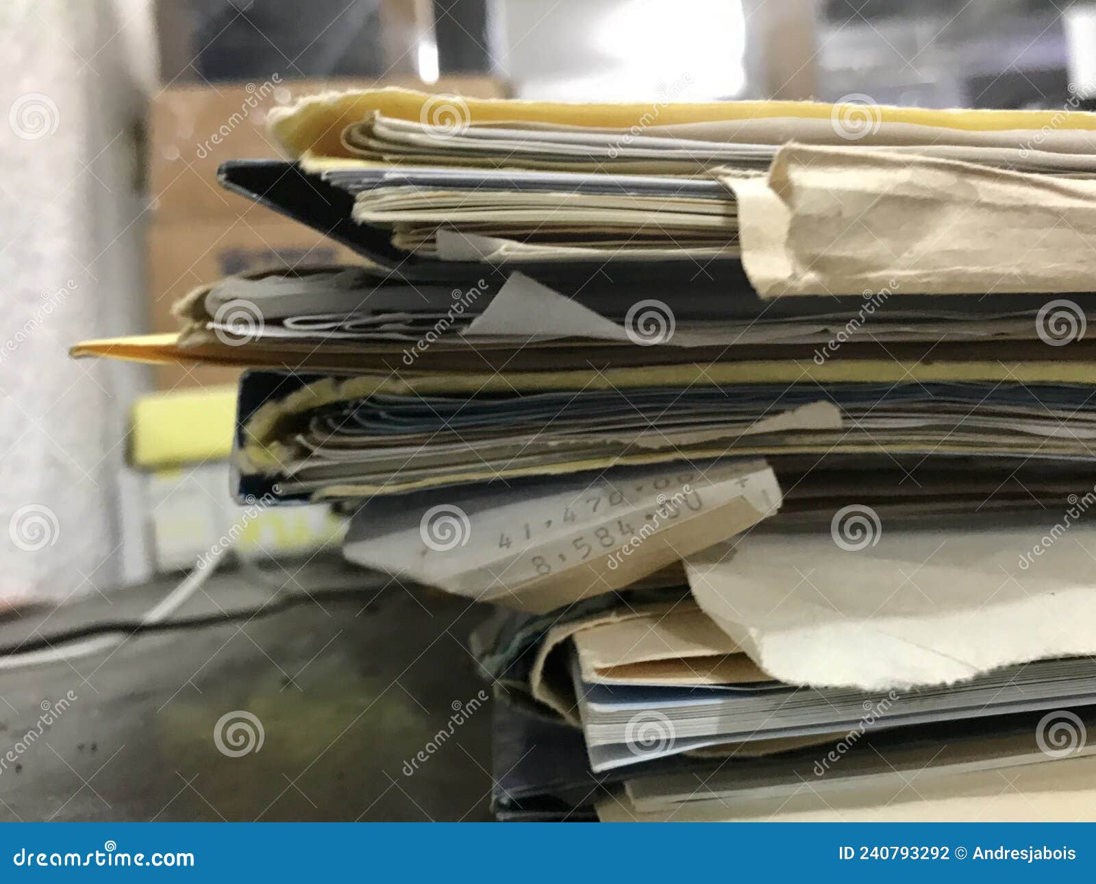 Some File Folders Stacked on Top of a Desk Stock Photo - Image of ...