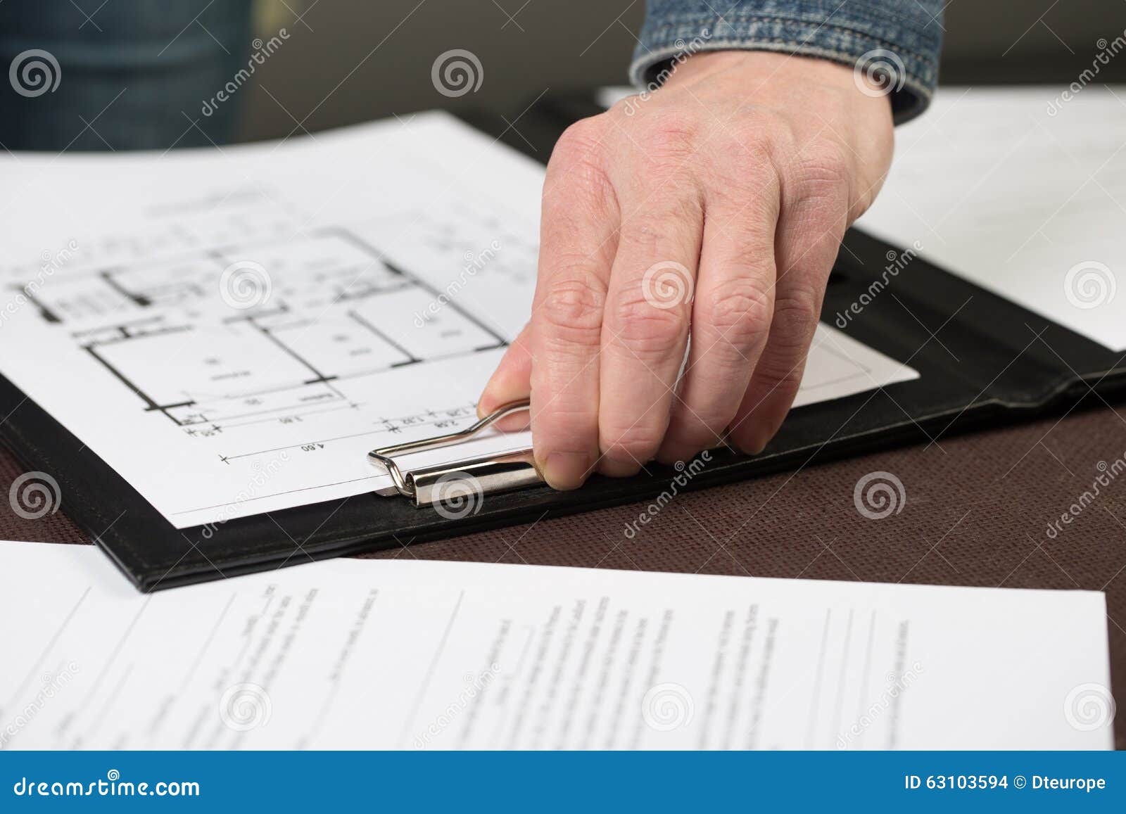 Some Floorplans are Clipped To a Clipboard by an Architect. Stock Photo ...