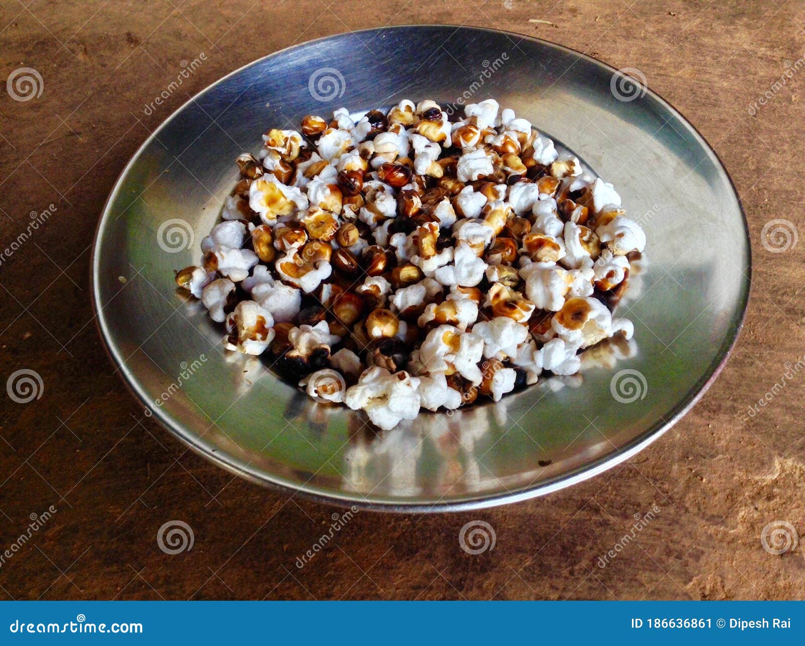 Some Fried Maize in the Middle of Silver Plate Stock Image - Image of ...