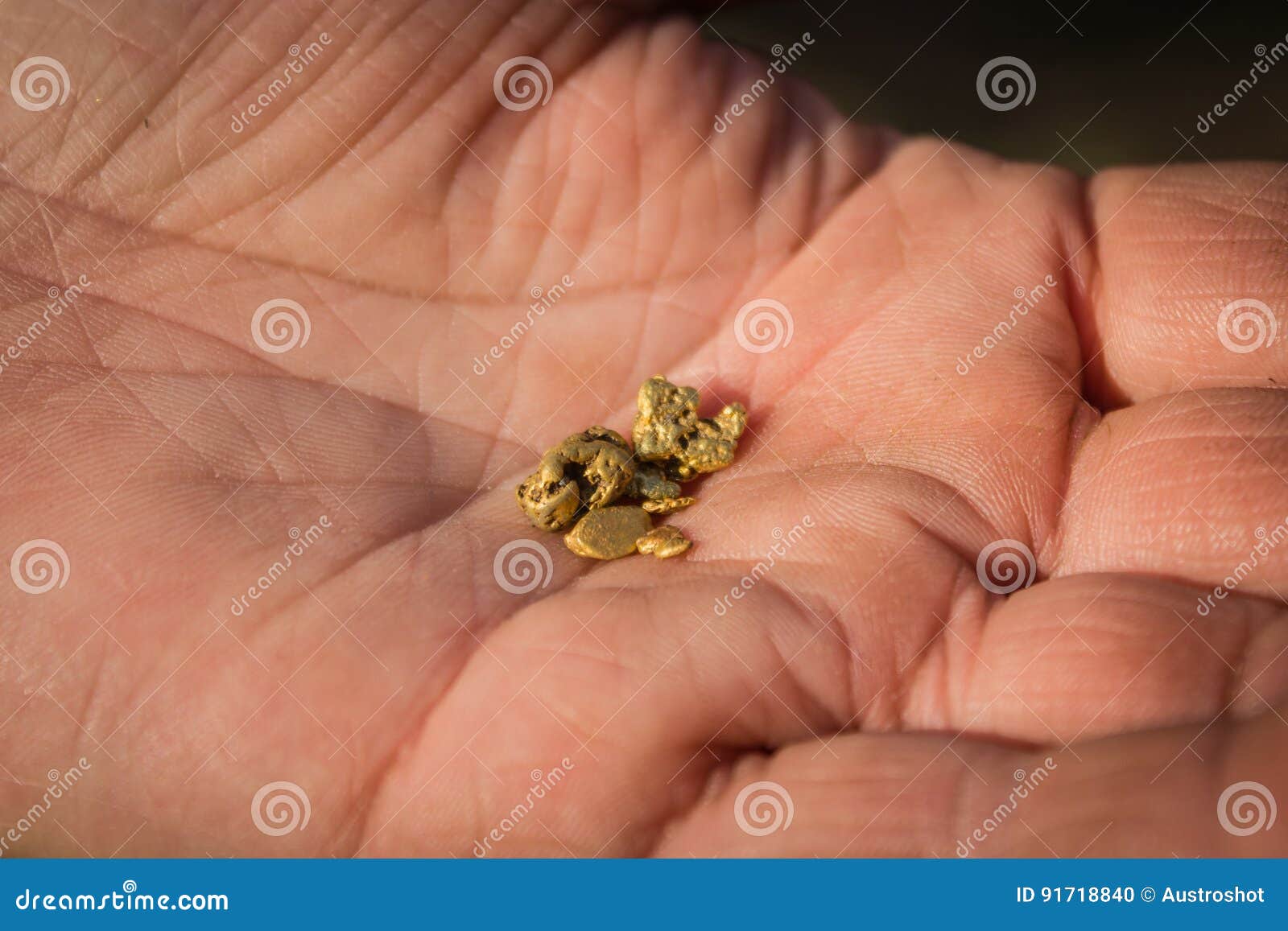 Some Gold Nuggets in the Hand Stock Photo - Image of hallmark, soap ...