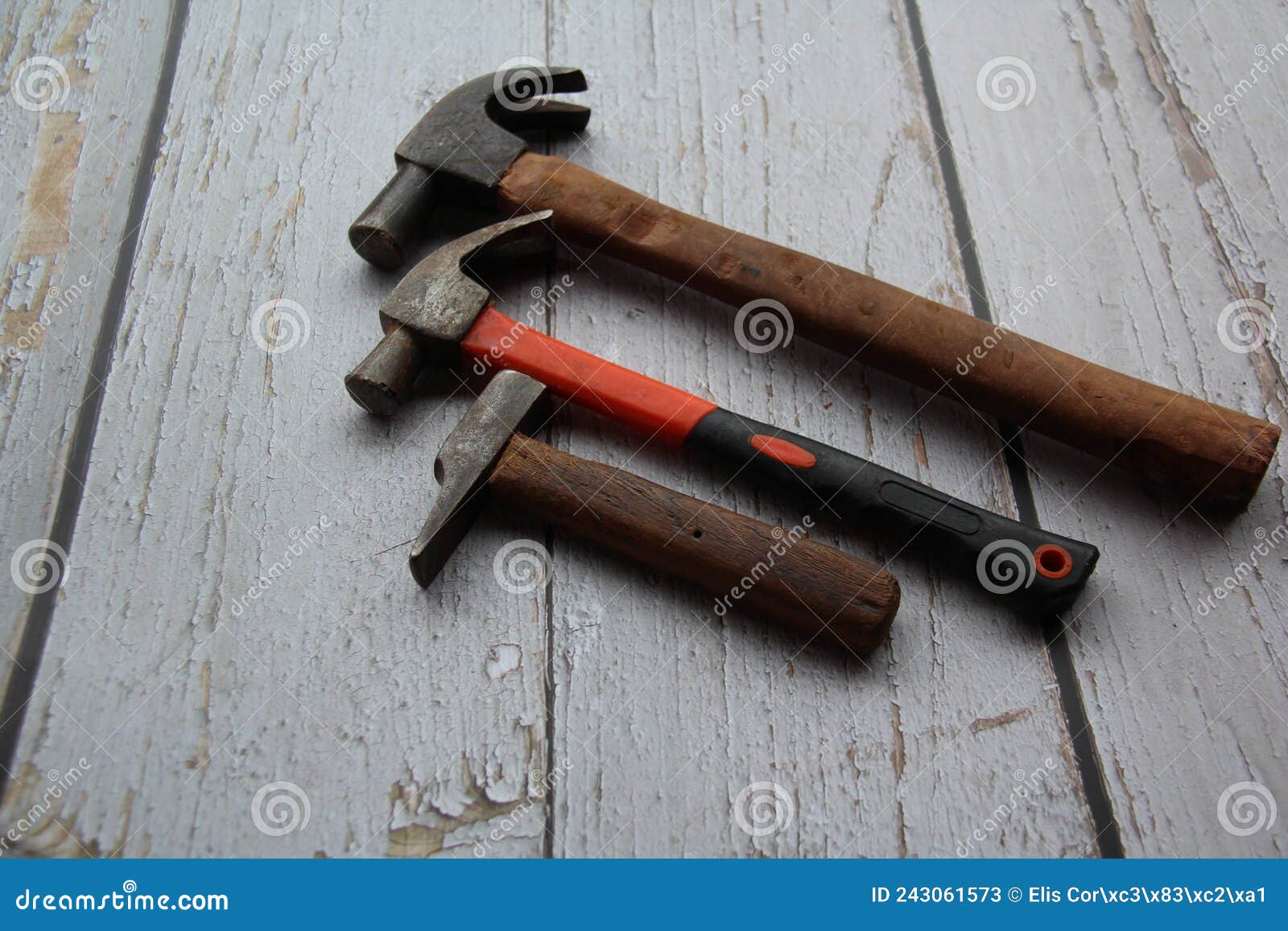 Some Hammers of Sizes and Models on an Antique Wooden Table. View from ...
