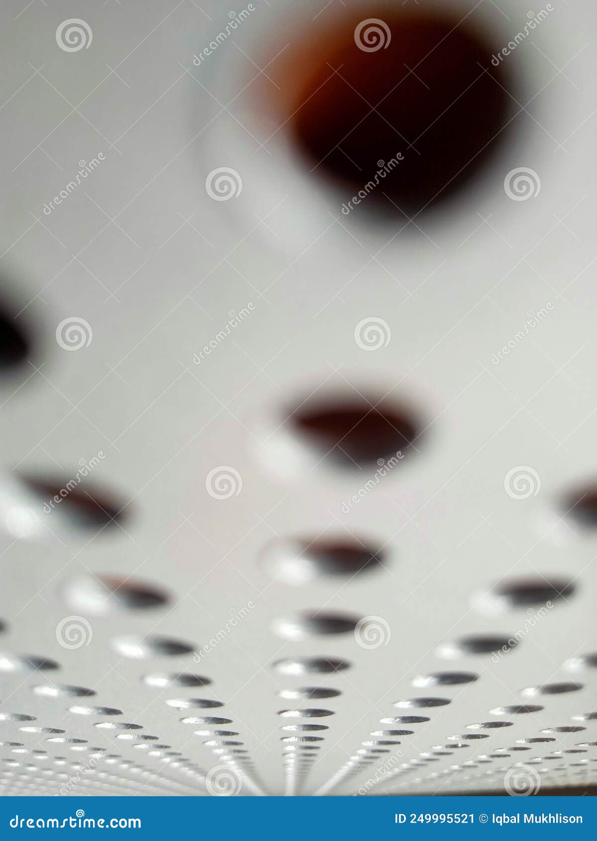 Some Iron with Holes Under it Stock Image - Image of hand, white: 249995521