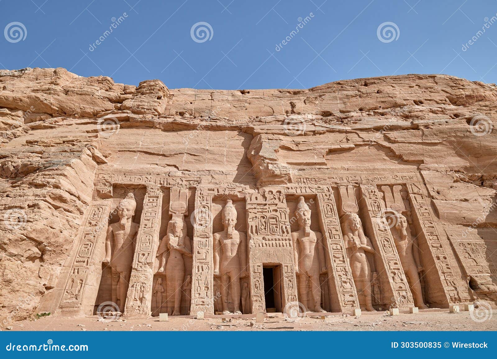 Some Large Stone Statues of People in Front of a Building Stock Image ...