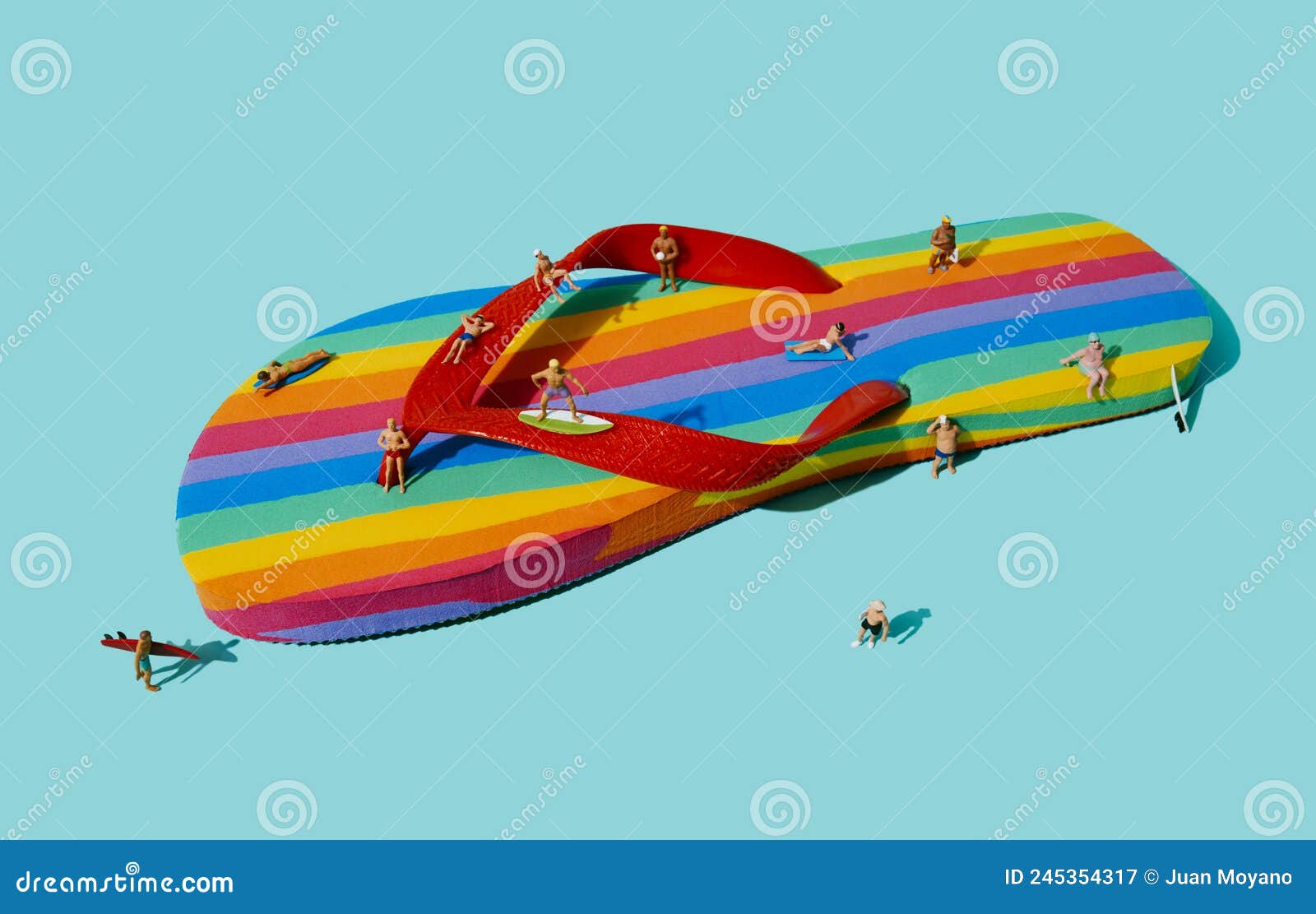 Some Miniature Men on a Rainbow Flip-flop Stock Image - Image of ...