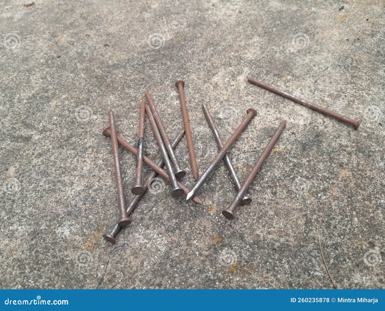 Some Nails Scattered on the Concrete Floor of an Old Building Stock ...