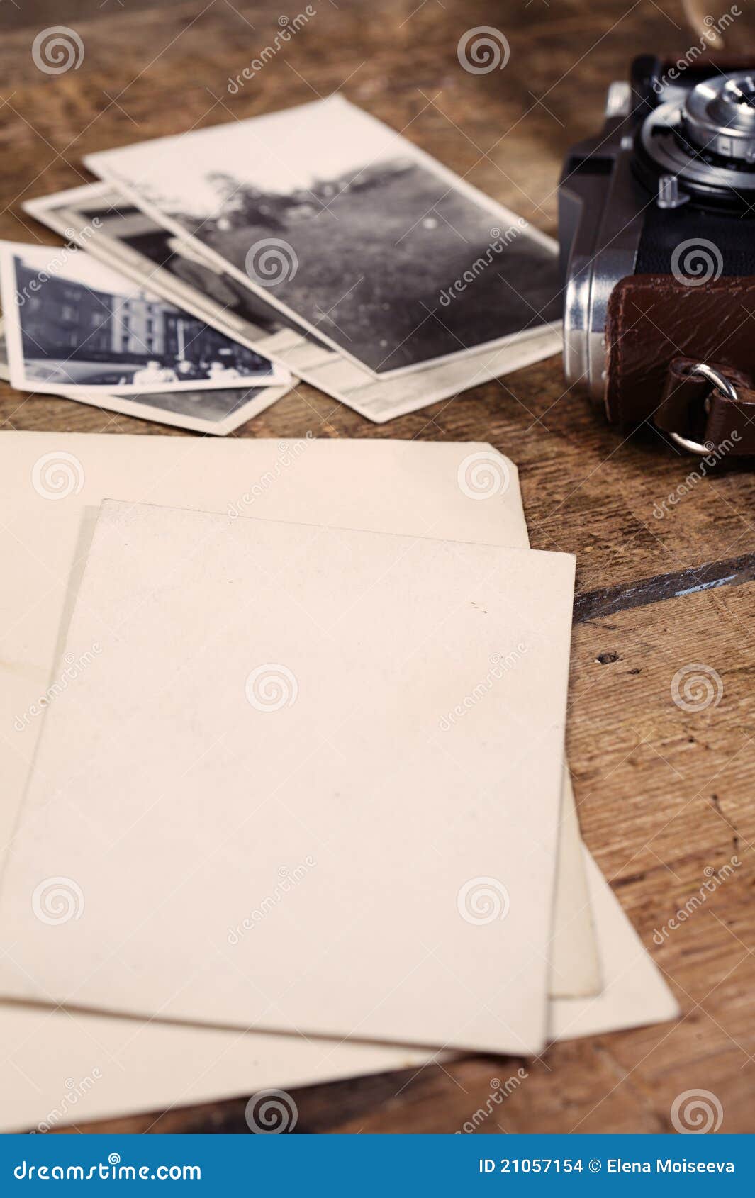 Some Old Photos and Vintage Camera on Wooden Table Stock Photo - Image ...