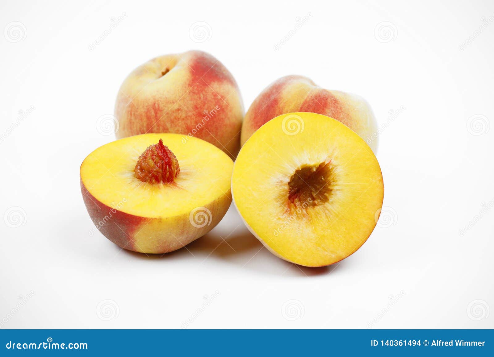 Some Peaches on White Ground, One Opened with Its Core. Stock Photo ...