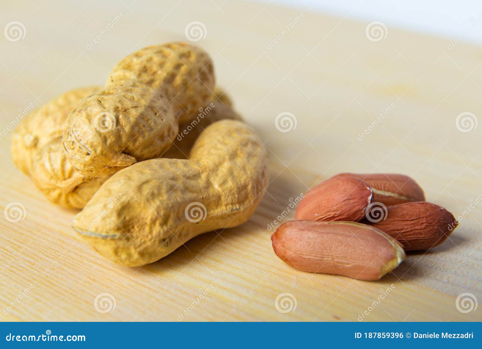 Peanuts on a Wooden Surface Stock Photo - Image of snack, nourishment ...