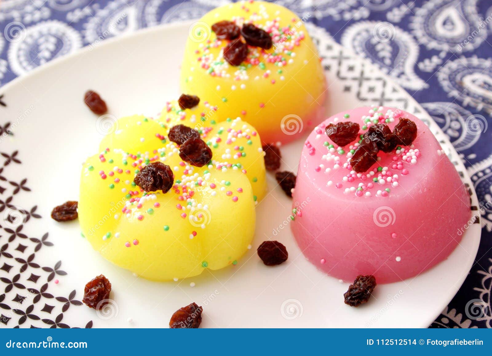Pink and yellow pudding stock photo. Image of sprinkles - 112512514