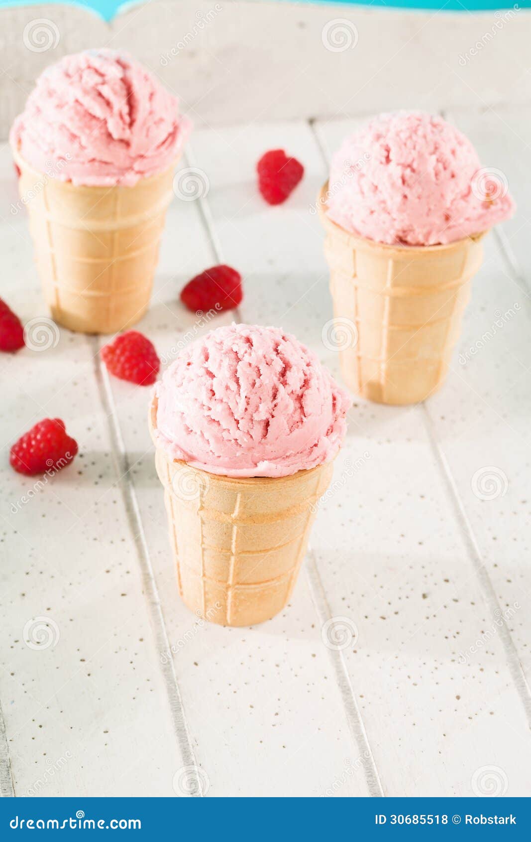 Some Raspberry Ice Cream Cones Stock Photo - Image of cream, white ...