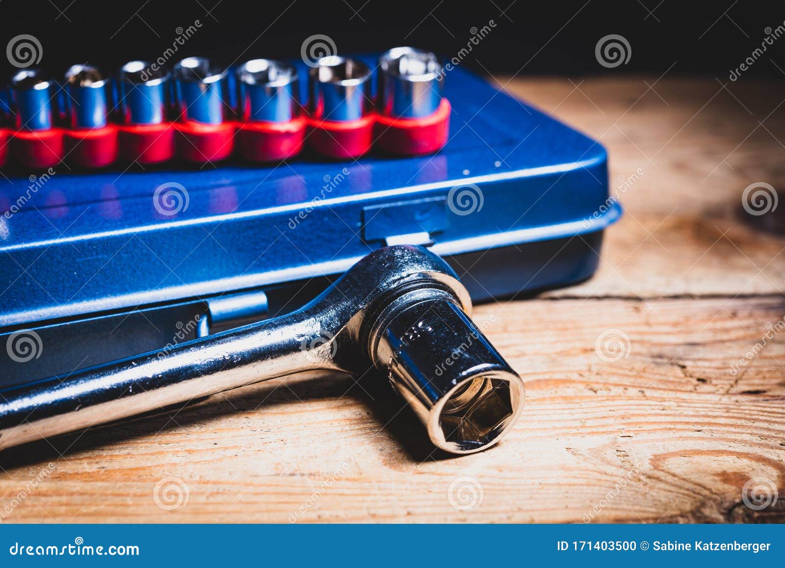 A Socket Wrench and Its Inserts on a Blue Tool Box Stock Photo - Image ...