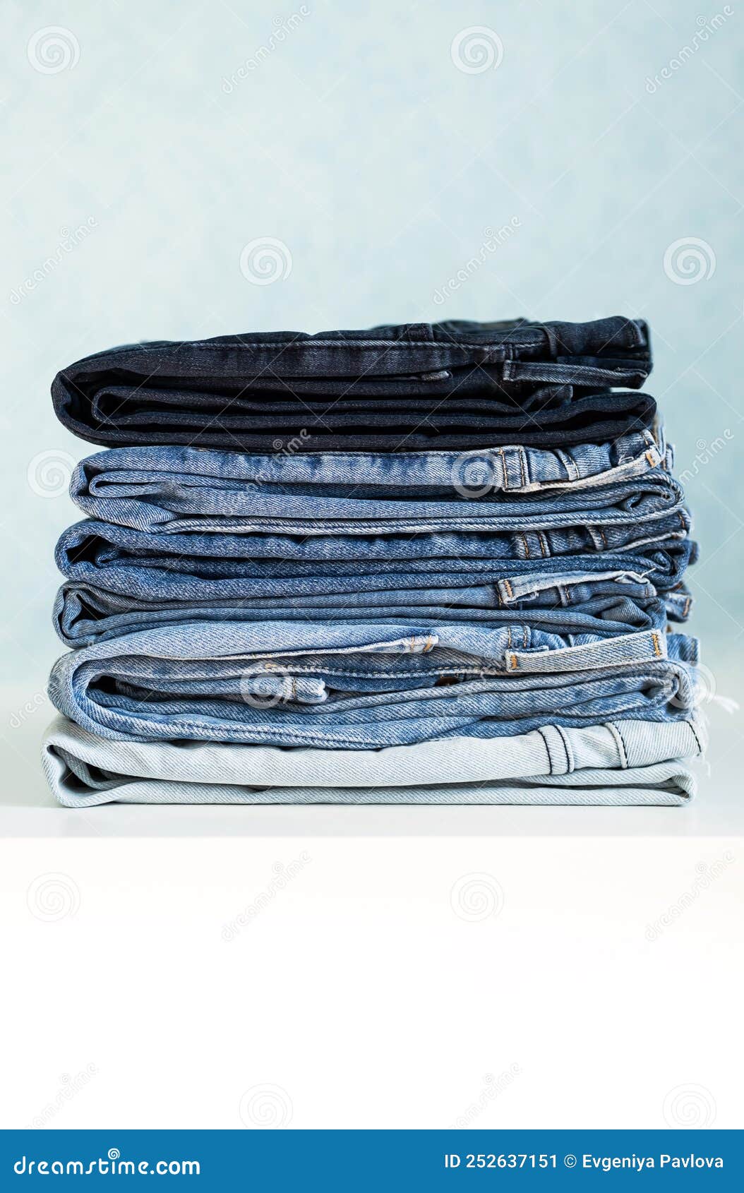 Some Stacked Blue Jeans, Close Up. Denim Collection Stock Image - Image ...