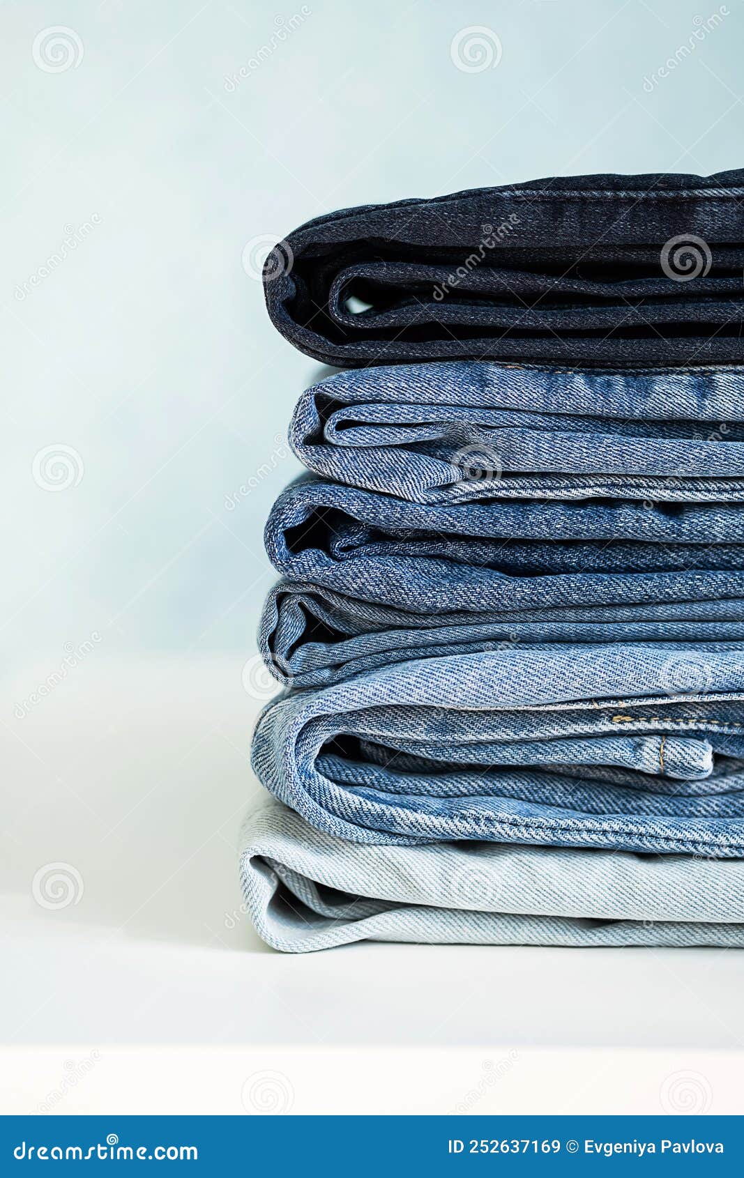 Some Stacked Blue Jeans, Close Up. Denim Collection Stock Image - Image ...