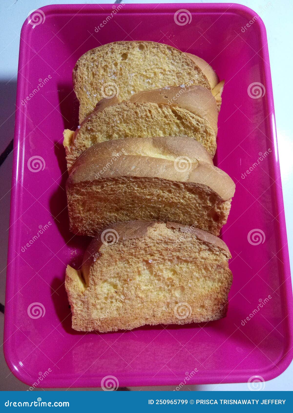 Some Sweet Crispy Yellow Bread Toast in a Purple Plastic Box Stock ...
