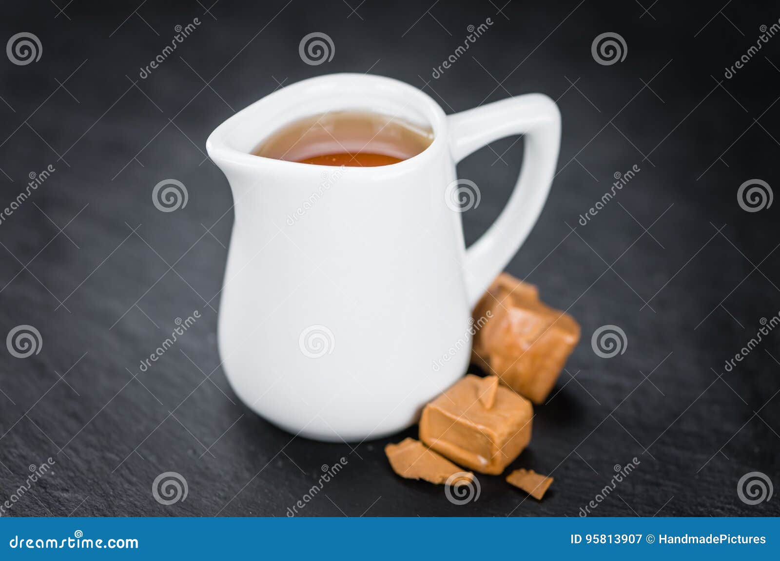 Some Syrup & X28;Caramel Taste& X29; on a Dark Slate Slab Stock Image ...