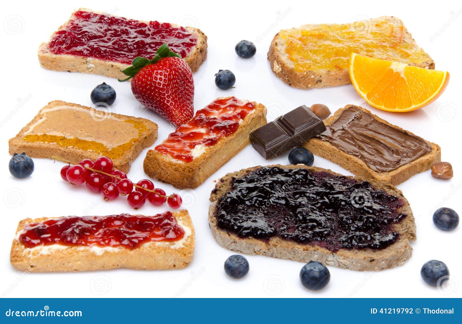 Some Toasts with Jams, Honey and Hazelnut Spread Stock Photo - Image of ...