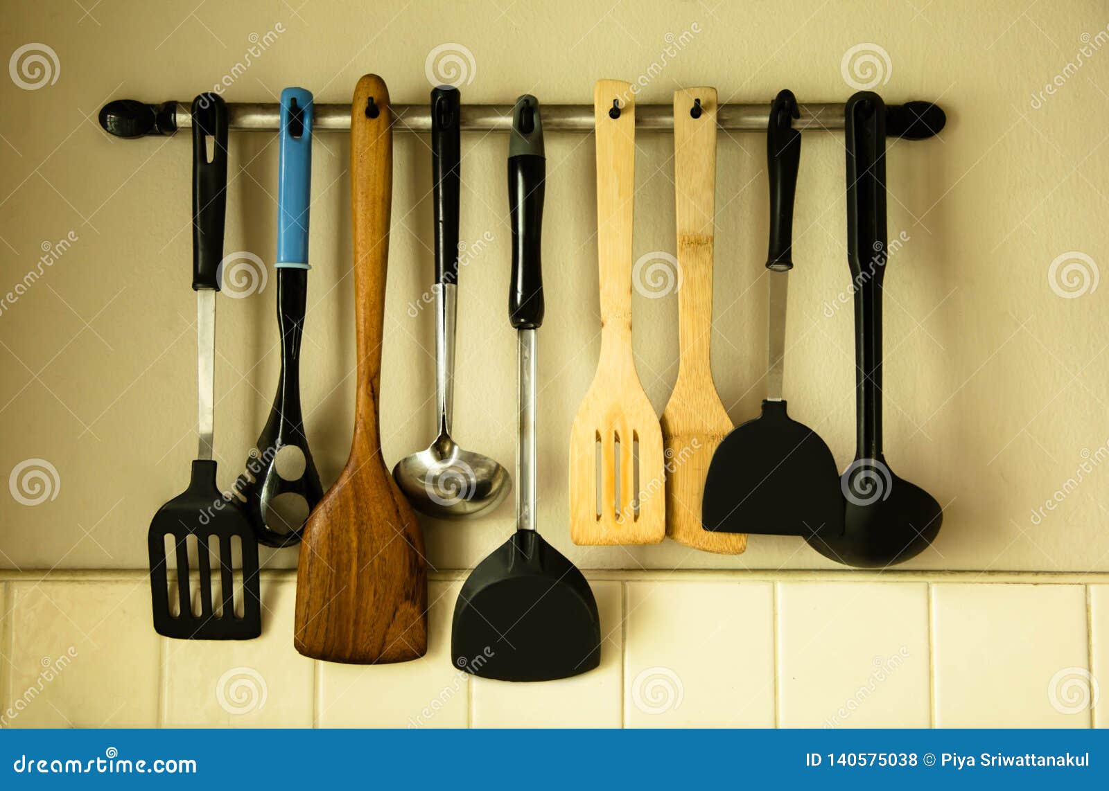 Some Utensil on the Kitchen Wall Stock Photo - Image of holding ...