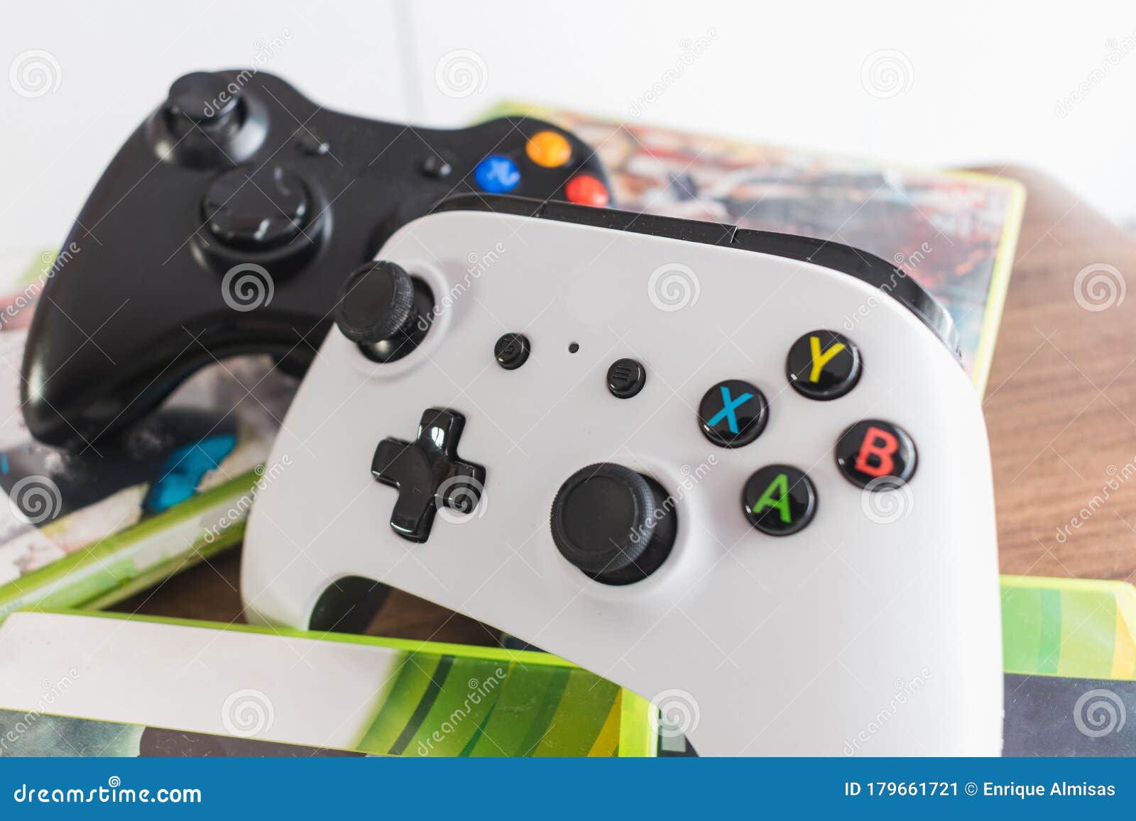 Some Video Game Controllers on Game Boxes Stock Image - Image of ...