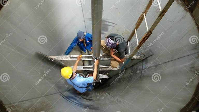 Some Workers are Working in Tanks on Construction Projects Editorial ...