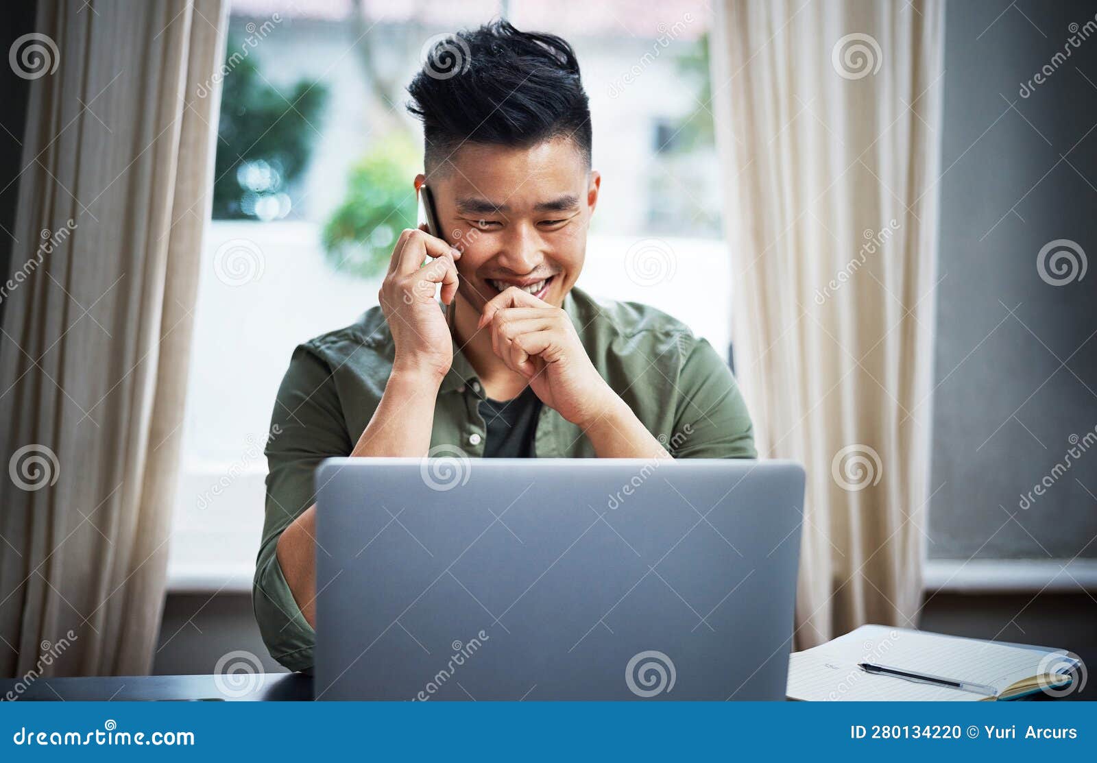 This is Some of Your Best Work. a Handsome Young Man Taking a Call ...