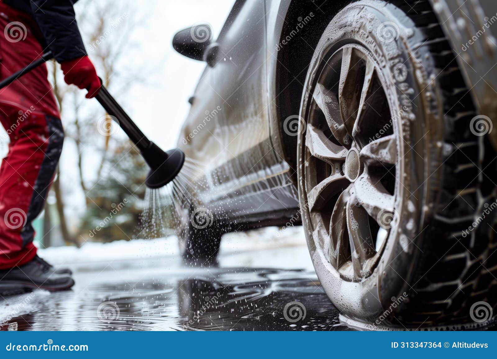 Someone Drying a Wheel with a Blower after a Car Wash Stock ...