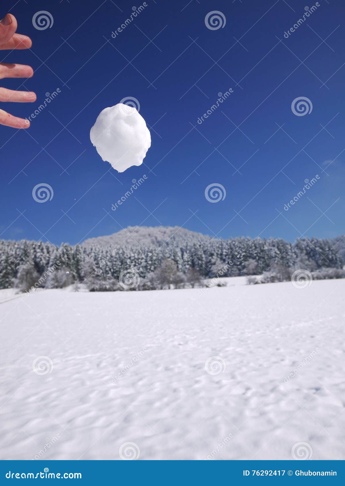 Someone throwing snowball stock image. Image of winter - 76292417
