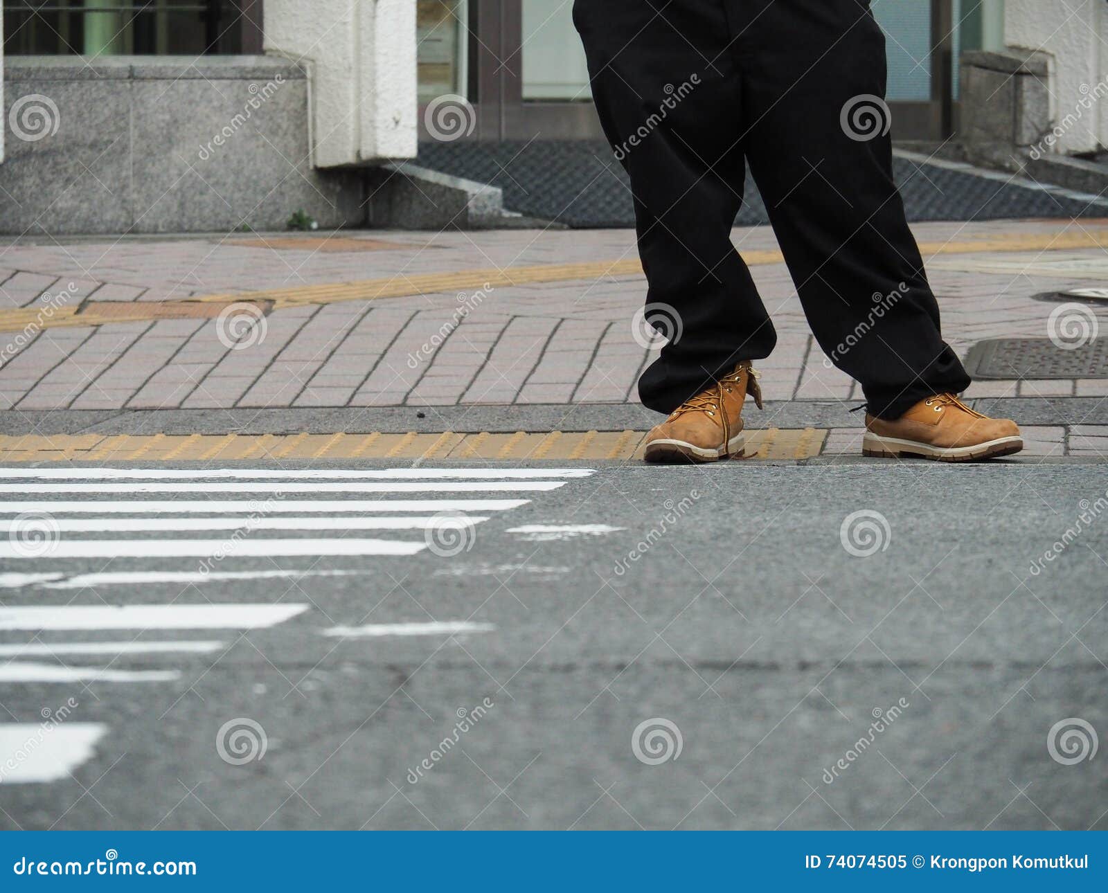 Someone Wait Across the Road Stock Image - Image of sign, road: 74074505