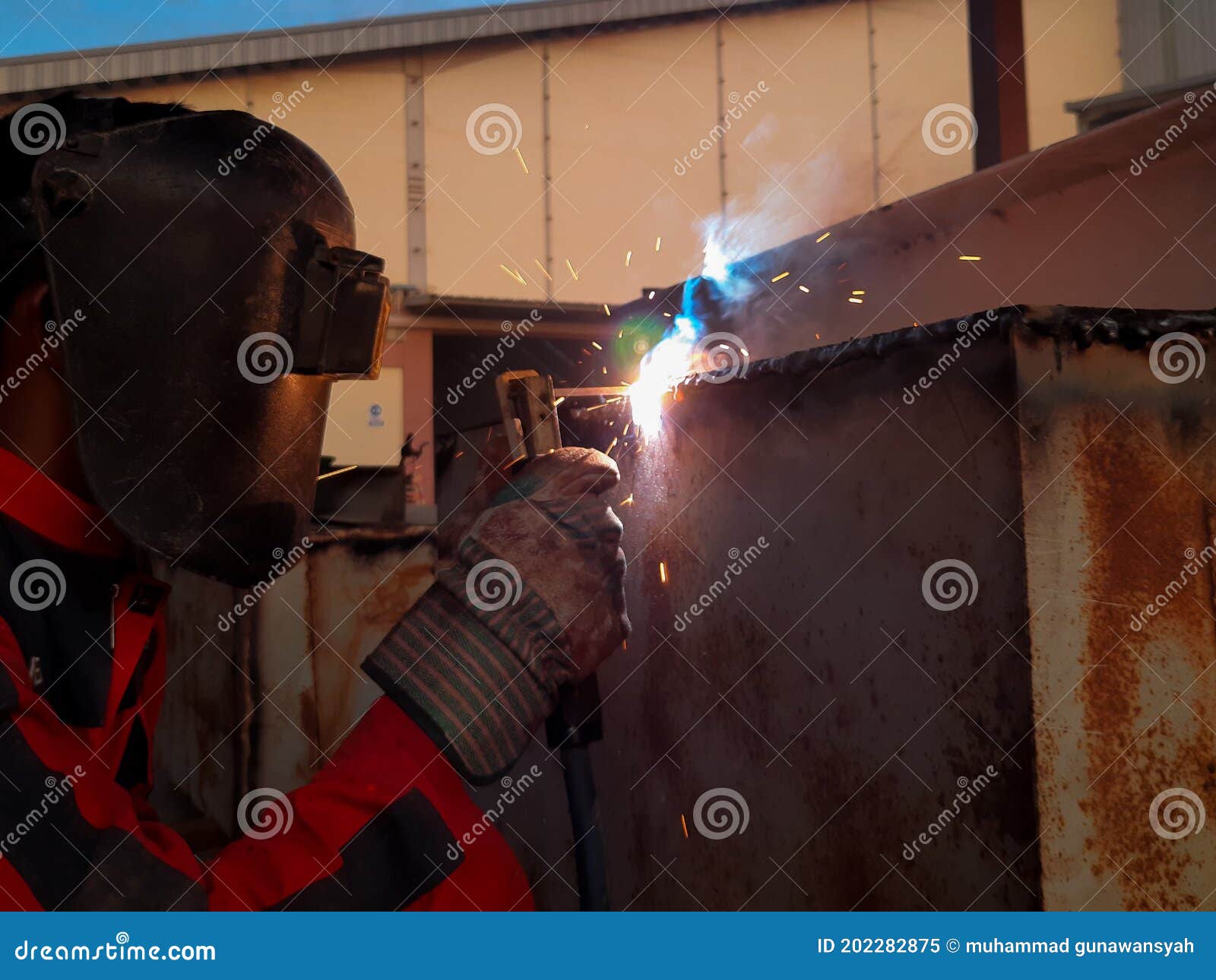 Someone is Welding a Trash Can Made of Iron Stock Image - Image of iron ...