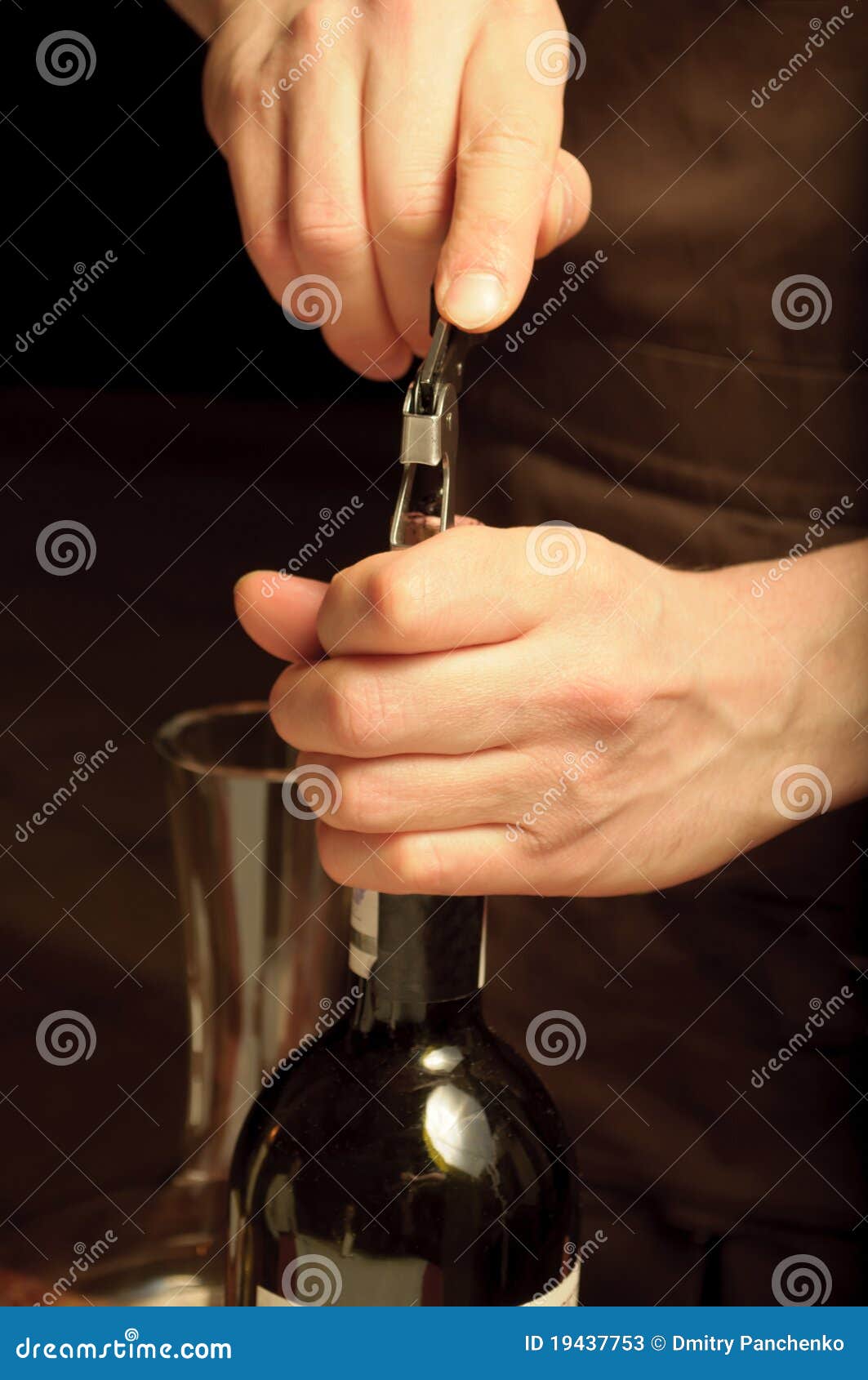 A Sommelier Opening Wine Bottle Stock Image - Image of corkscrew ...