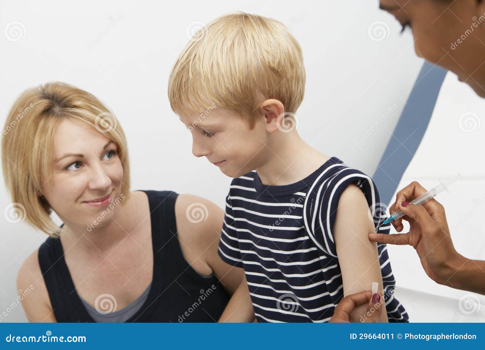 Son Being Injected By A Female Doctor Royalty-Free Stock Photography ...