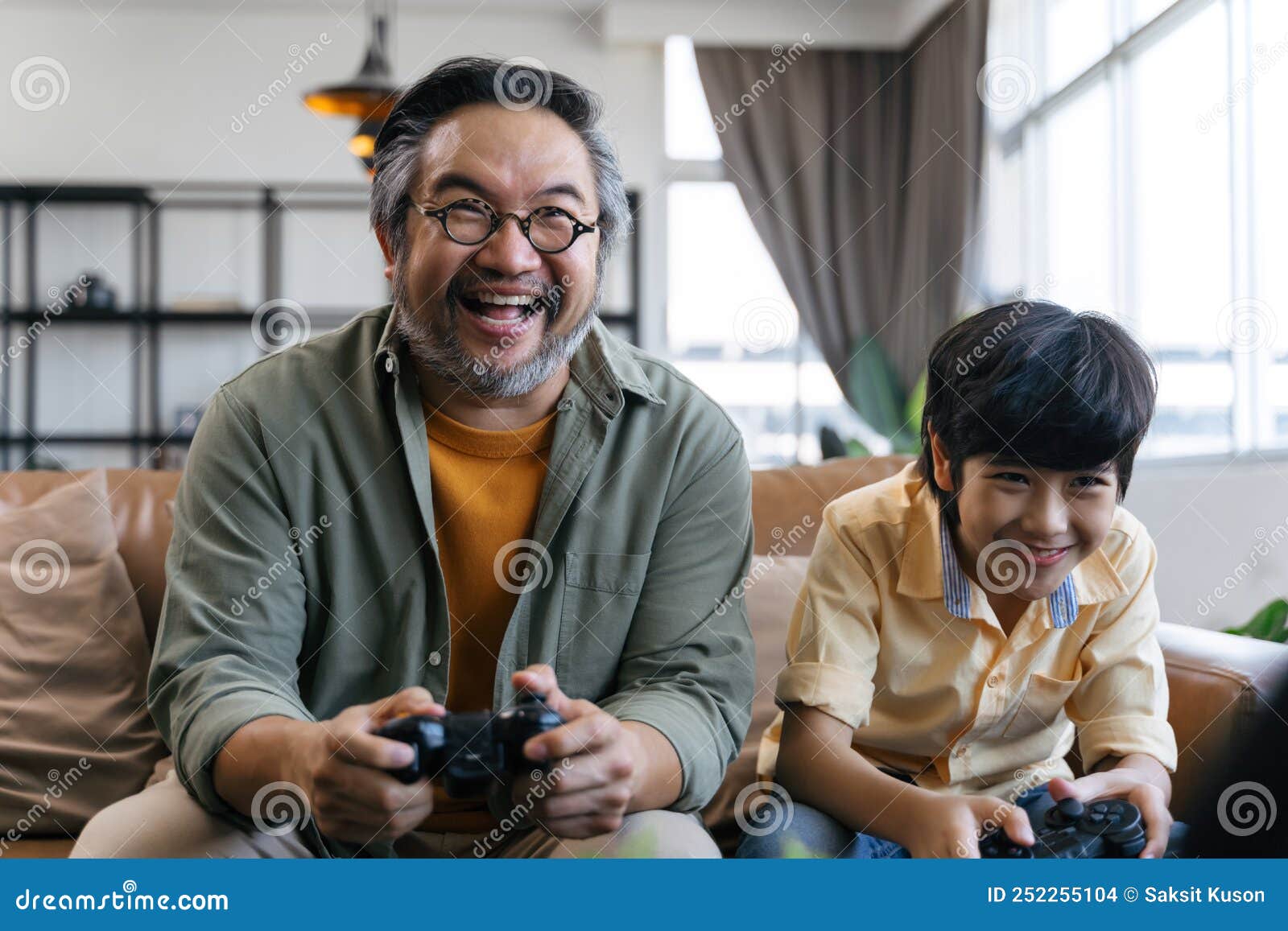 Son and Dad Playing Video .game at Home Stock Photo - Image of person ...