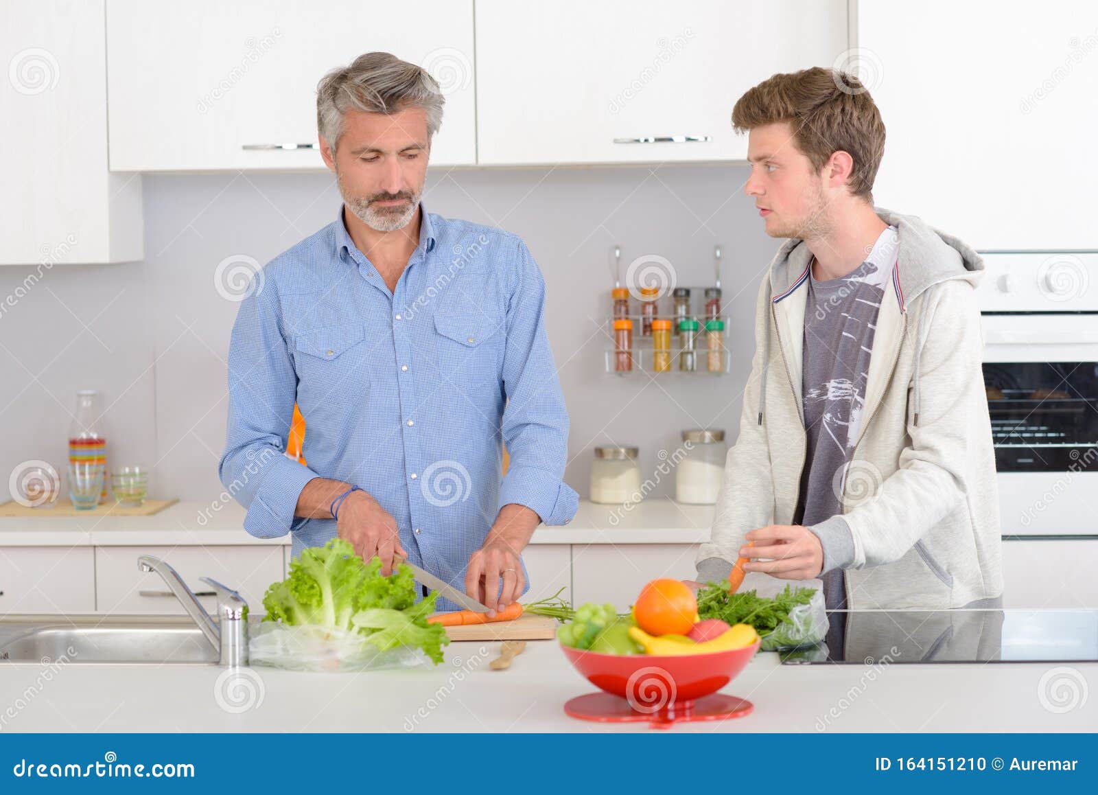 Son and Father Preparing Lunch Stock Photo - Image of salad, kitchen ...