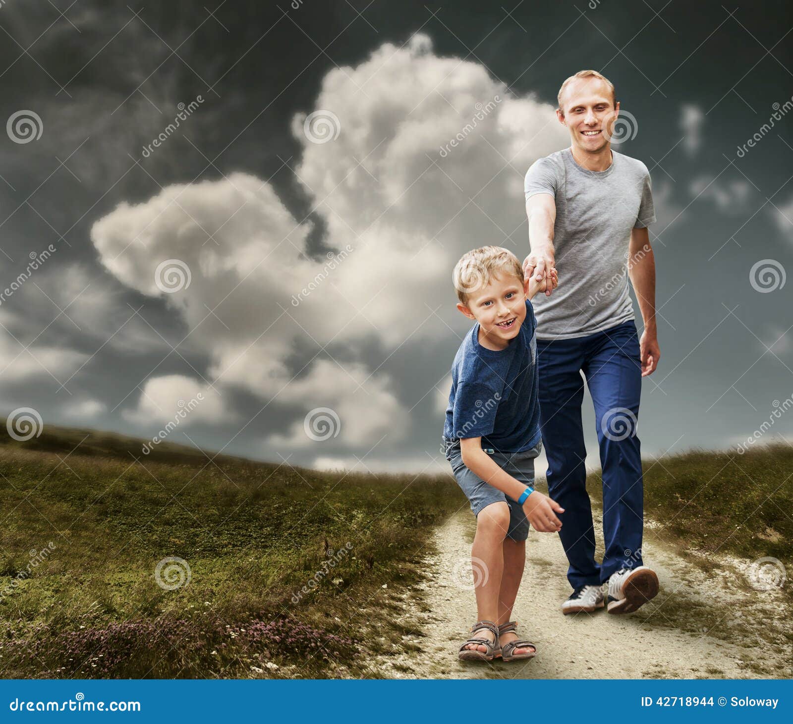 Son with Father Running on the Footpath Stock Photo - Image of outdoor ...