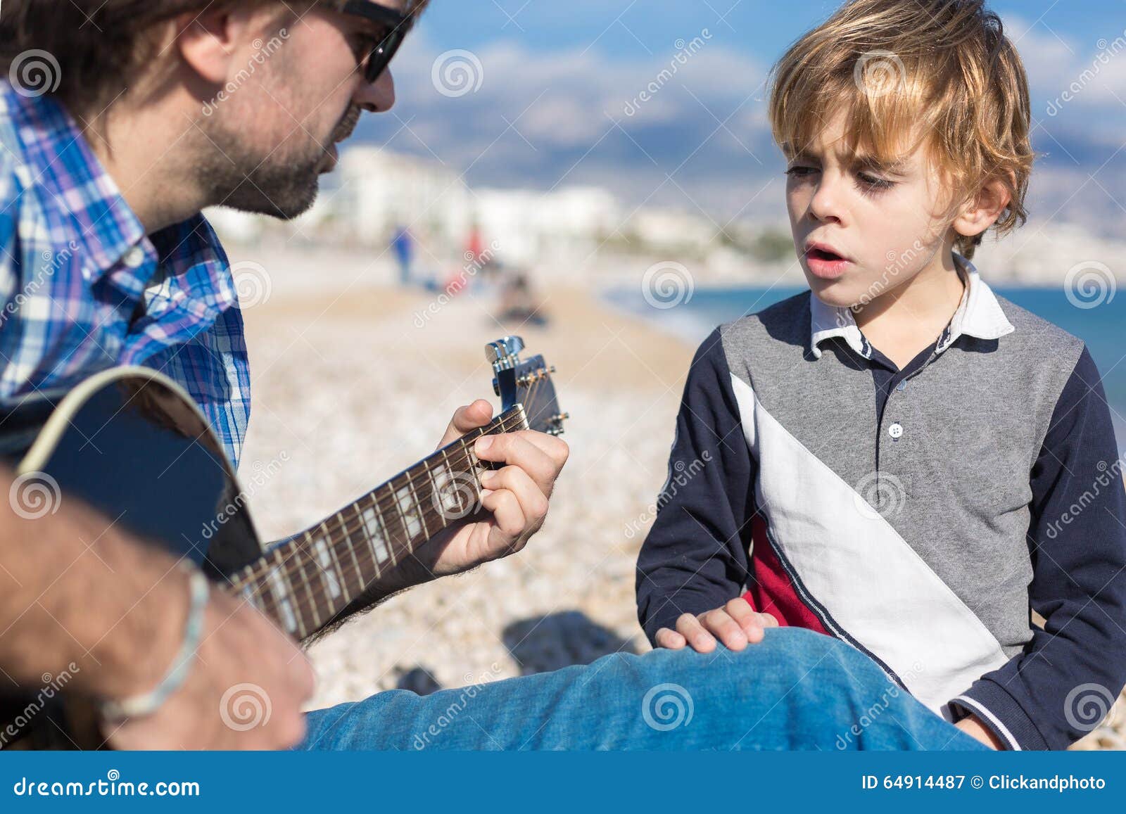 Son and Father Singing Song on Beach Stock Image - Image of male, coast ...