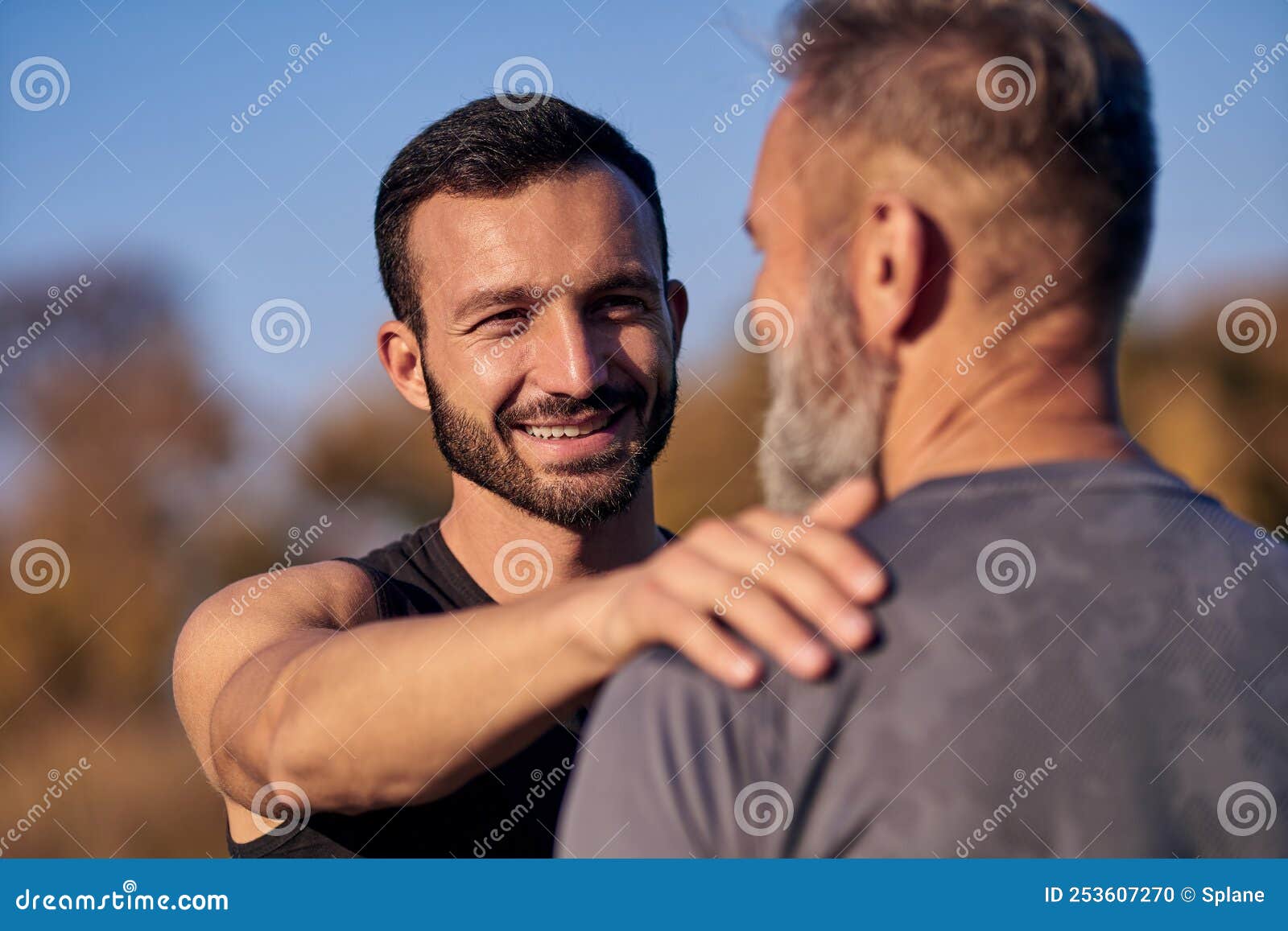 The Son and Father Standing Together. Stock Photo - Image of athletes ...