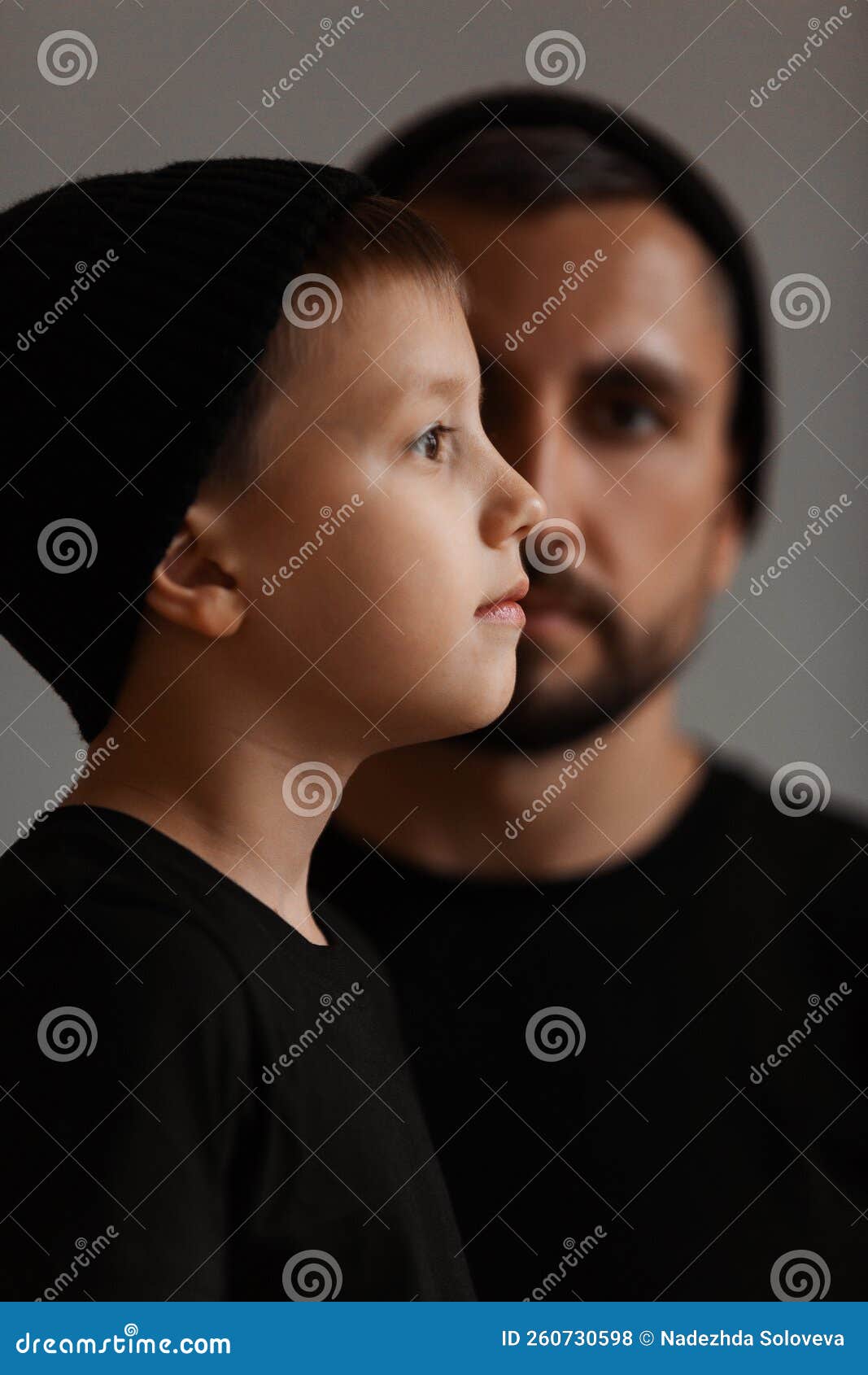 Son and his fathers faces stock photo. Image of fooling - 260730598