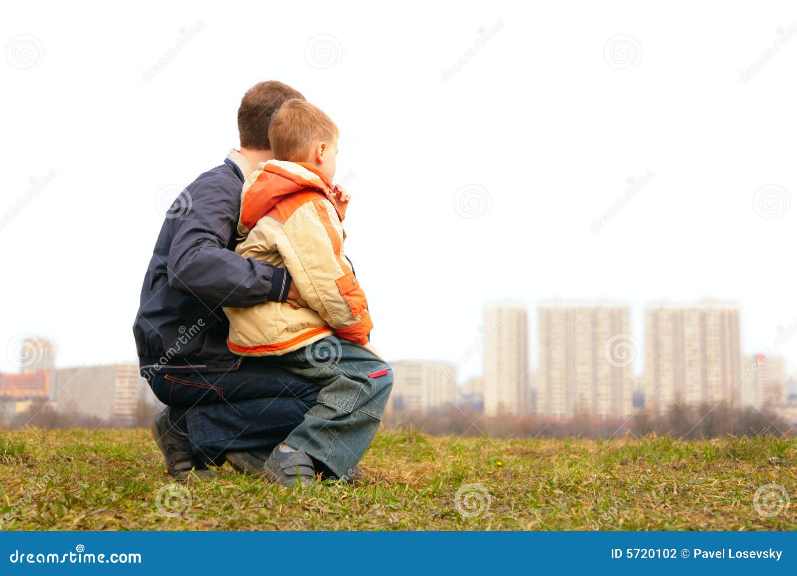 Son on Lap of Father Outdoor Stock Photo - Image of grass, people: 5720102