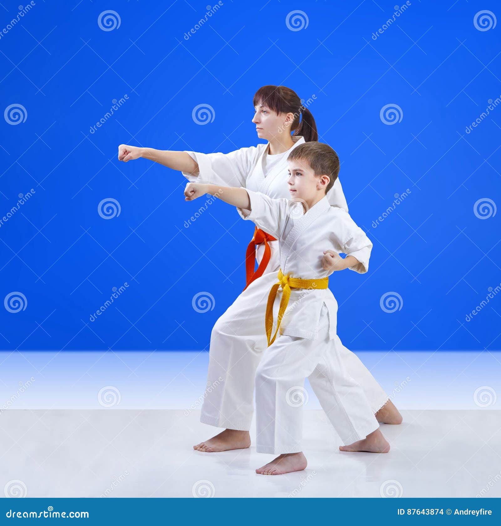 Son and Mother are Training Punch Arm Stock Photo - Image of belt ...